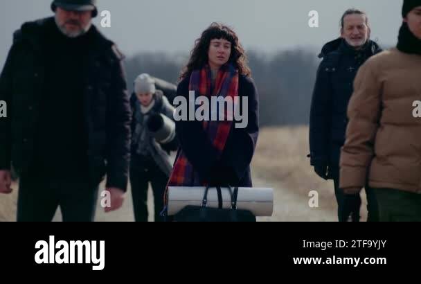 Sad Woman Amidst Refugees Migrating During War Stock Video Footage - Alamy