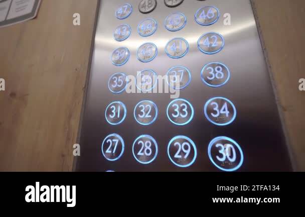 The dial is an elevator panel with burning numbers and a blue backlight ...