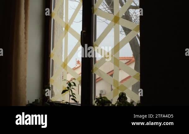 Tape on windows Stock Videos & Footage - HD and 4K Video Clips - Alamy