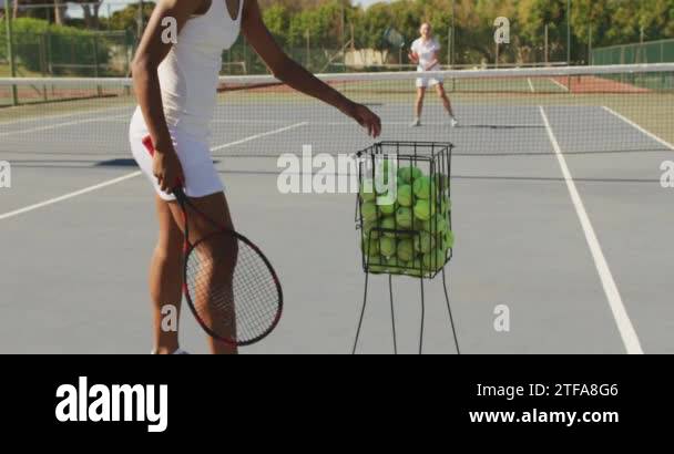 Video of african american female tennis player holding racket and ...