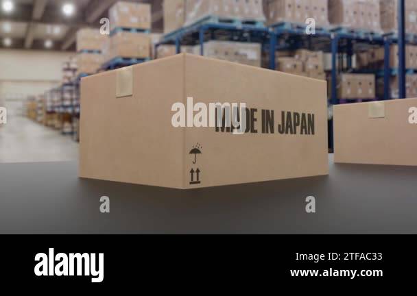 Boxes with MADE IN JAPAN text on conveyor. JAPAN goods related loopable ...