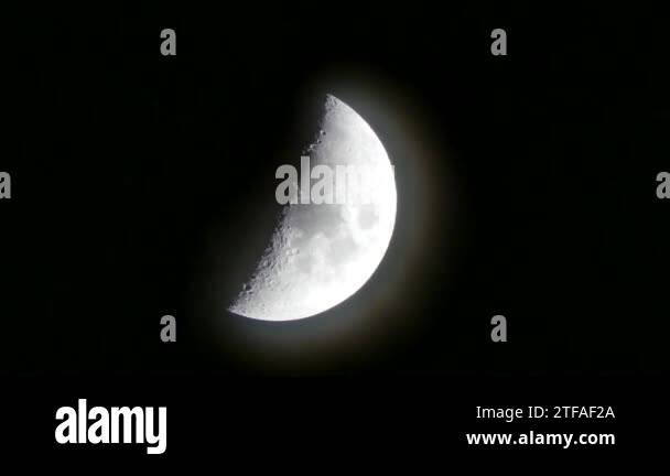 The night sky and the moon appearing in the fog, the half moon and the ...