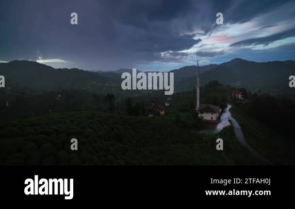 8K 7680x4320.Tea plantations in rural Pakistan.Muslim mosque in hilly ...