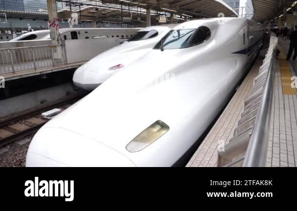 A Japanese Bullet Train Nozomi, Shinkansen depart Tokyo station. High quality footage Stock ...