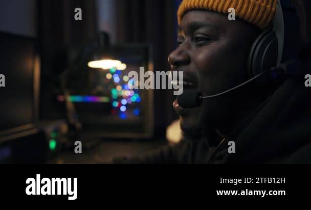 A shocked man is playing an emotional computer game, reliving the ...