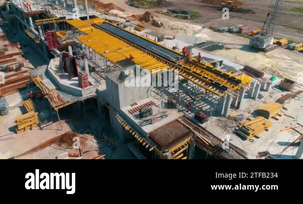 Construction process of a modern football stadium. Builders make ...