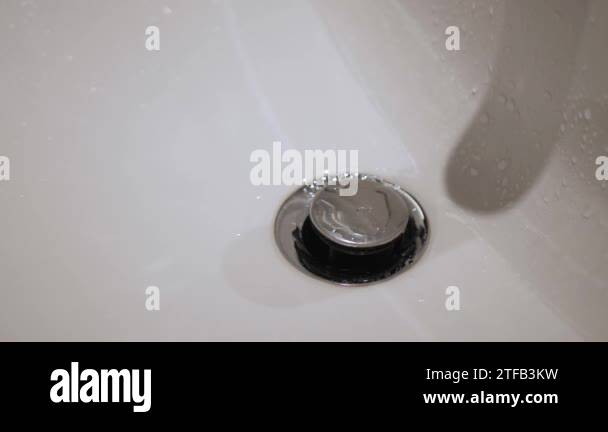 turn on running water flows from the tap to the white sink and turn off ...