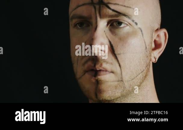 lonely man in the darkness with signs over his face: sad, opening eyes ...