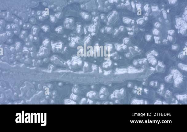 Top down view of empty frozen pond. Filmed in 4k, drone video Stock ...