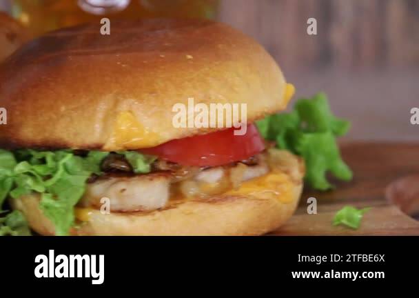 Burger beer lunch Stock Videos & Footage - HD and 4K Video Clips - Alamy