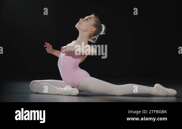 Teen girl child kid teenager gymnast doing backbend exercises in dance ...