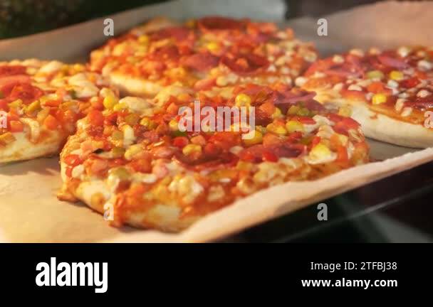 Frozen pizza cooked Stock Videos & Footage - HD and 4K Video Clips - Alamy