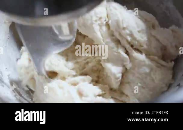 4K Close up bread dough making process by using flour mixing machine ...