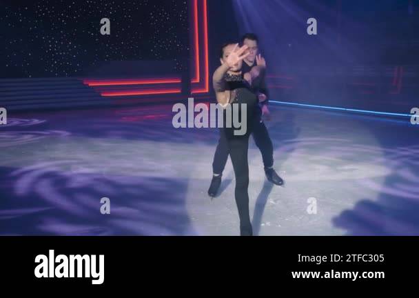 Female figure skater moves to camera in arabesque,beautifully ...