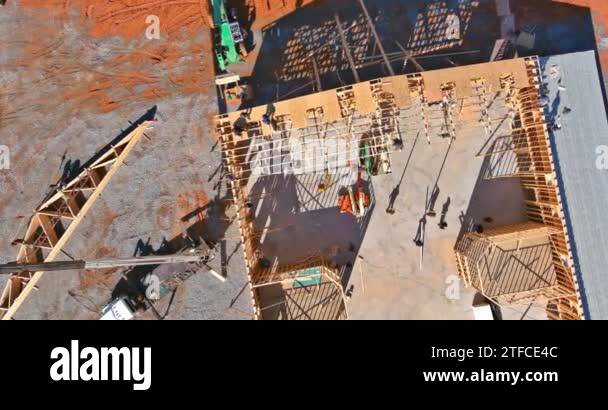 Detail of roof crane holds wood framing rafter truss system timber ...