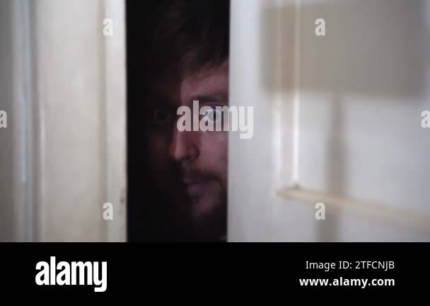 Patient with mental disorder haunting his victim watching through the ...