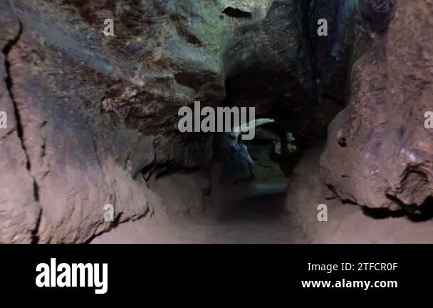 Cinematic video of a dark cave in 4k format, dark tunnel Stock Video ...