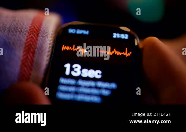 Man trying to measure ECG or Heart Rate at bar using smart watch Stock ...