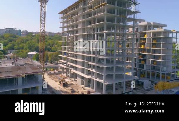 Construction of a multi-storey residential building aerial view. Span ...