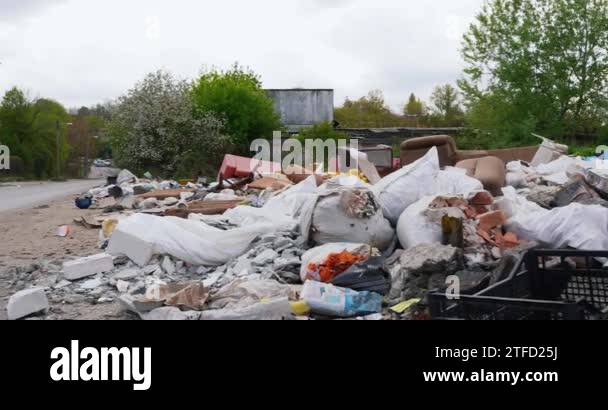 1 a wild dump in the center of the city in Europe made of various types ...