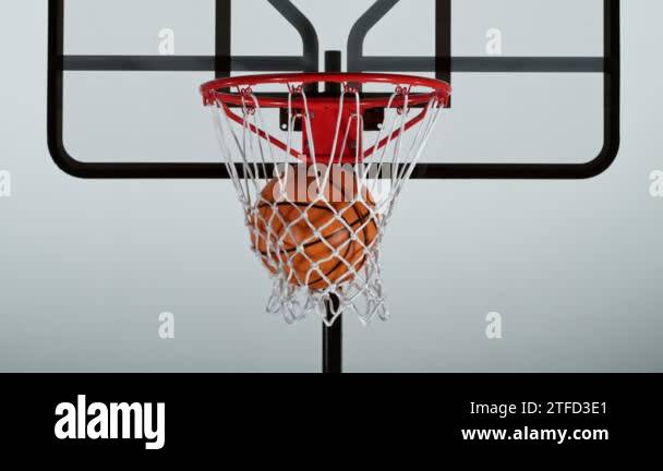 Super slow motion of basketball player running and scoring. Filmed on ...