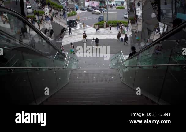 Tokyo, Japan-04 February, 2020: People reflections in the mirror of ...