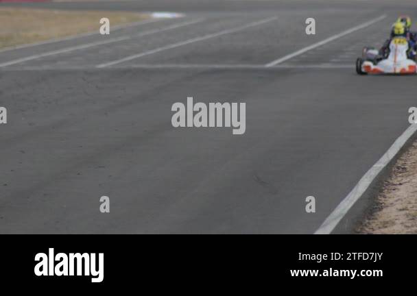 Karts passing in the finish line of a karting race Stock Video Footage ...