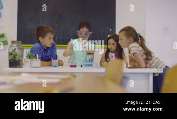 Elementary School Science Classroom: Enthusiastic Teacher Explains ...