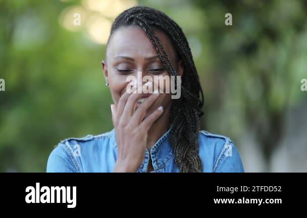 African woman spontaneous laughing. Person real life laugh and smile ...