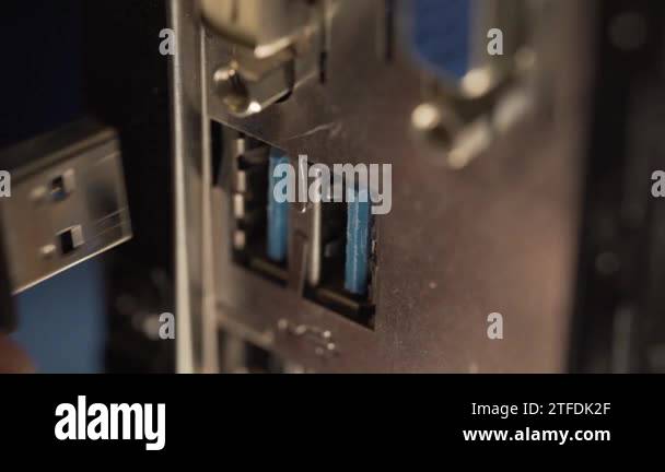 USB stick is plugged into a USB port on the PC Stock Video Footage - Alamy