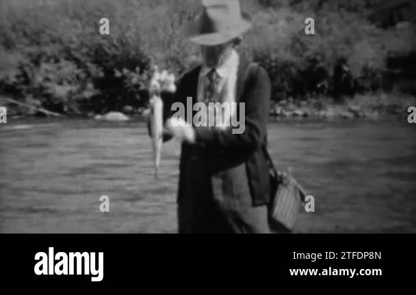 Fisherman showing trout fish catch Stock Video Footage - Alamy