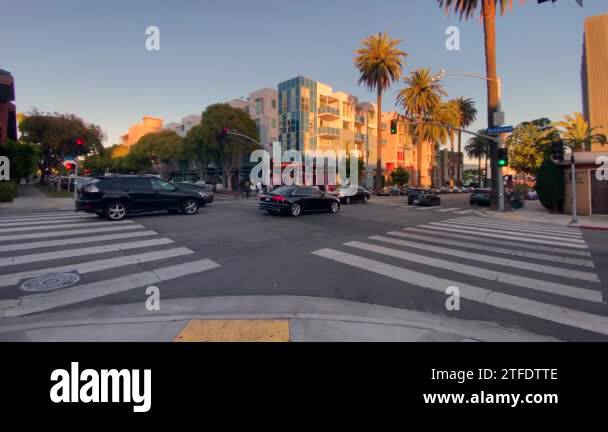 Traffic at Arizona intersection in downtown Santa Monica, sunny evening ...