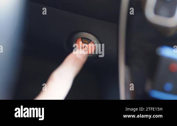 Pushing power ignition button to start stop keyless ignition hybrid ...