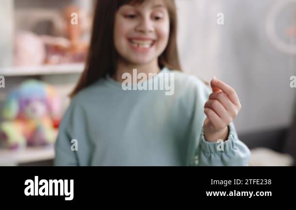Happy Cute little girl with tooth first milk temporary tooth. Childrens ...