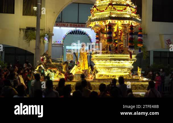 Georgetown, Penang, Malaysia - Jan 19 2022: Indian devotees raise hand ...