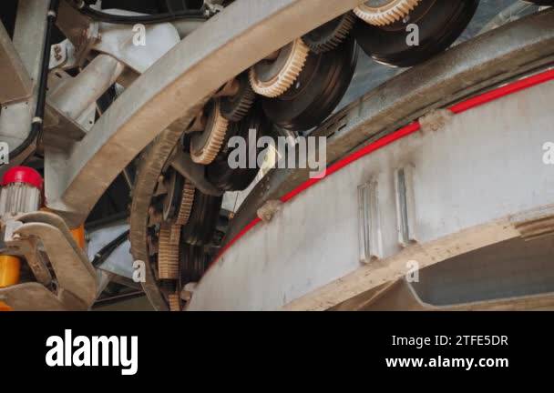 Cogwheels rotating and moving cabin. Cable car mechanism with rotating ...