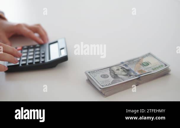 Accountant calculating dollars calculator Stock Videos & Footage - HD ...
