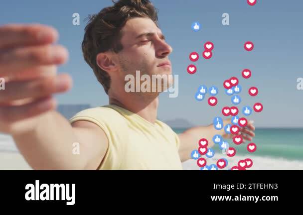 Animation of falling social media icons over caucasian man walking on ...