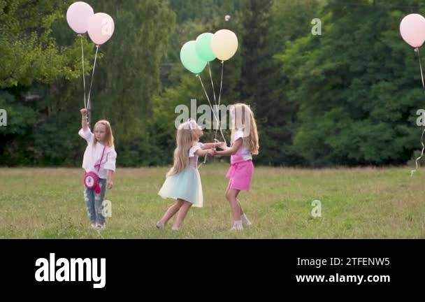 Children playing outdoors balloons Stock Videos & Footage - HD and 4K ...