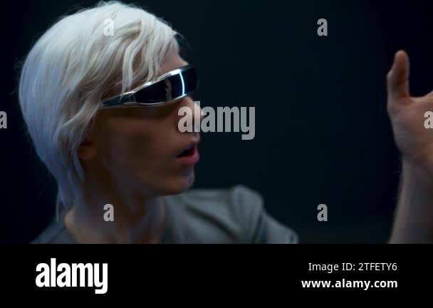 Amazed VR helmet man expressing wow reaction. Surprised gamer touching ...