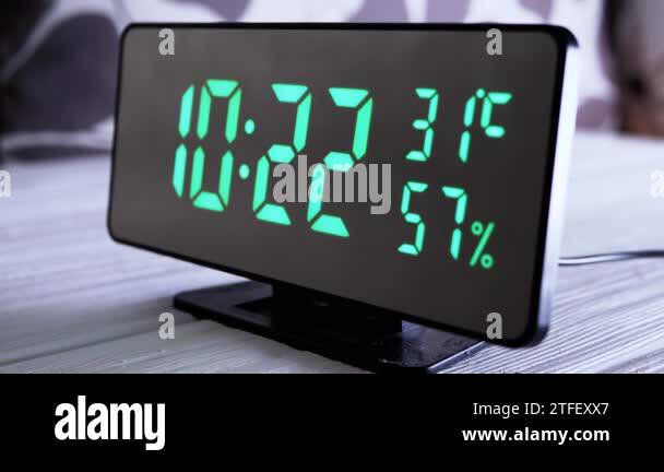 Digital Clock Showing Time on Green Display 10:22 AM, Temperature, Air ...