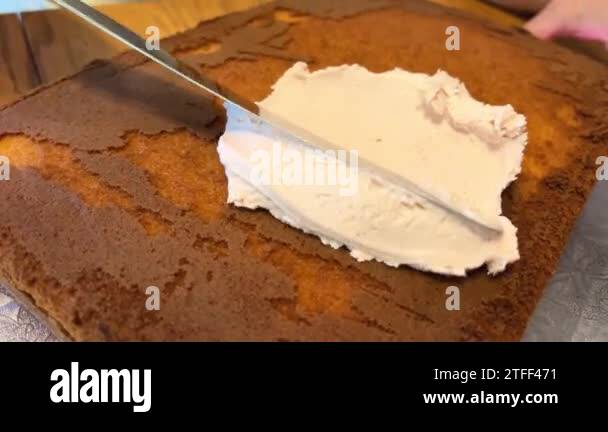 Cooking a cake in the home kitchen Spread cakes for making a large cake ...