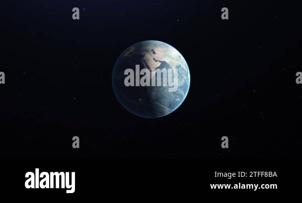 Rotating planet earth in space. Half of the planet is illuminated, on ...