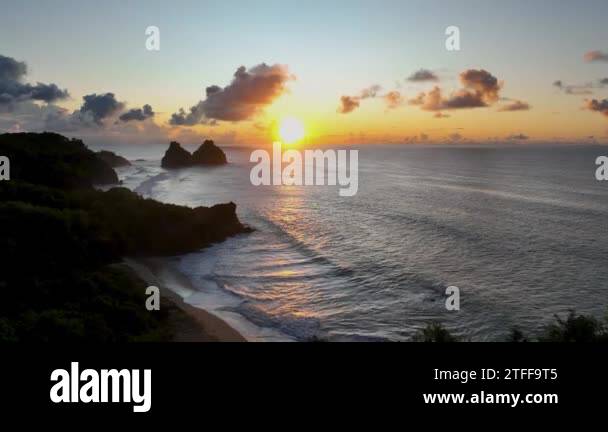 Sunset bay water archipelago of Fernando de Noronha at brazilian ...