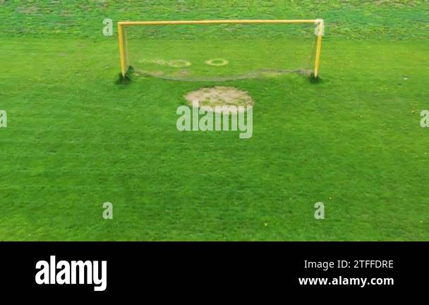 White gate on a football field. Green background of a stadium. Soccer ...
