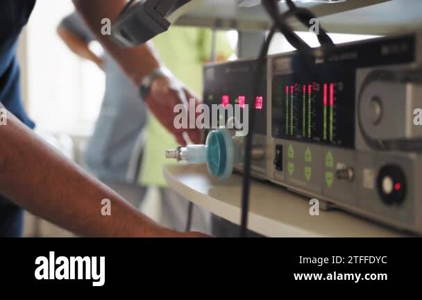 Starting the equipment for the operation. Senior Surgeon Enters ...