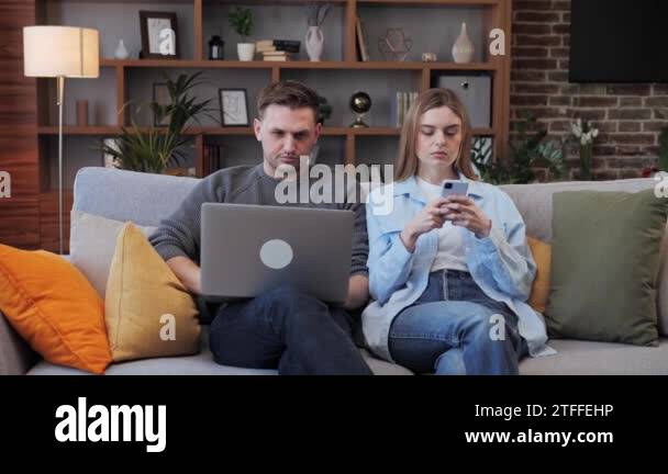 Young Couple of Married People Using Modern Technology Laptop and ...