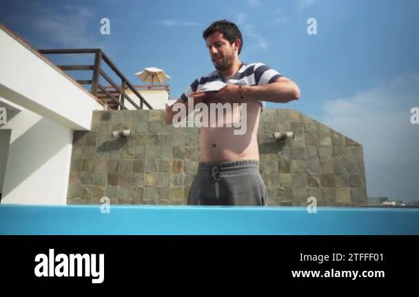 Man entering a pool Stock Videos & Footage - HD and 4K Video Clips - Alamy