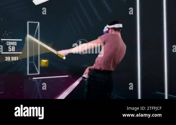 Person in virtual reality headset plays an action VR game in augmented ...