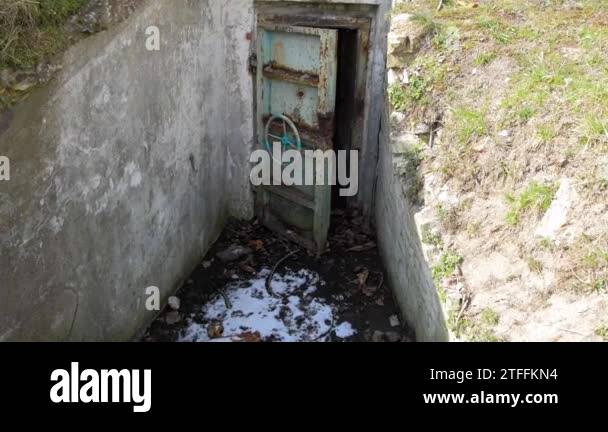 Entrance into the concrete bomb shelter to hide civil people, an ...